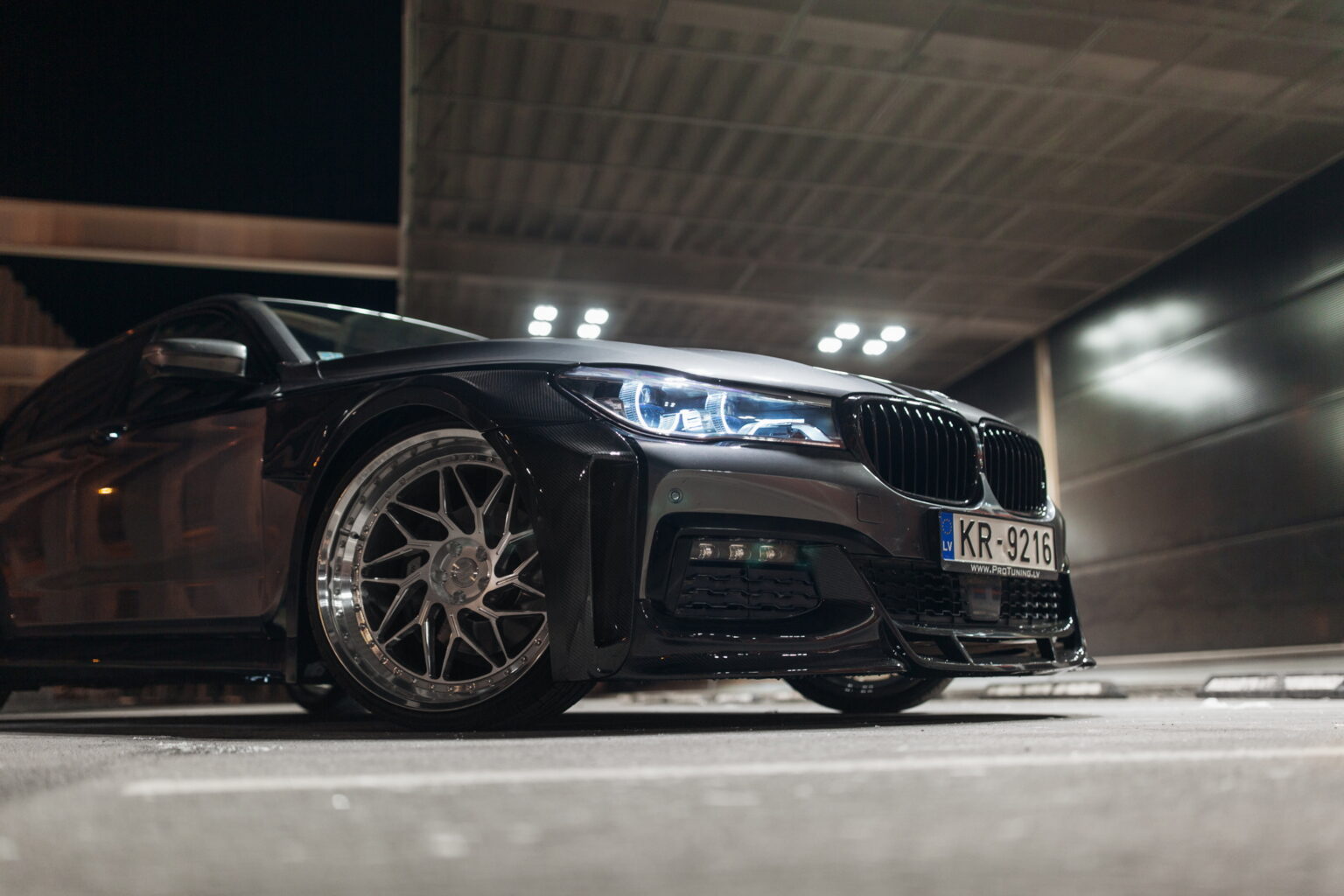BMW G11 7-Series Tries On A Carbon Fiber WideBody Kit And 22-Inch Wheels | Carscoops