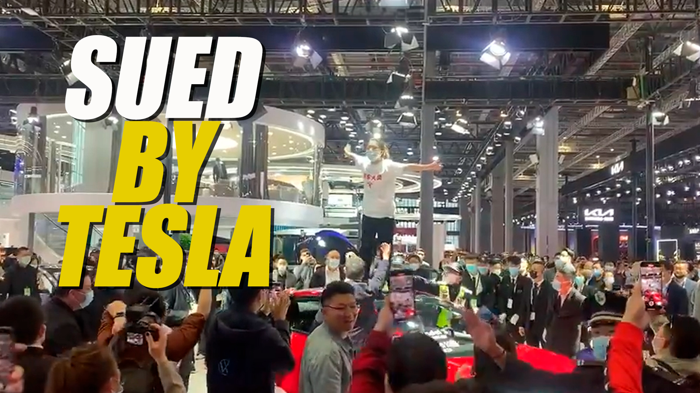 Viral Tesla Rooftop Protest Costs Woman $23,800 For Defamation | Carscoops