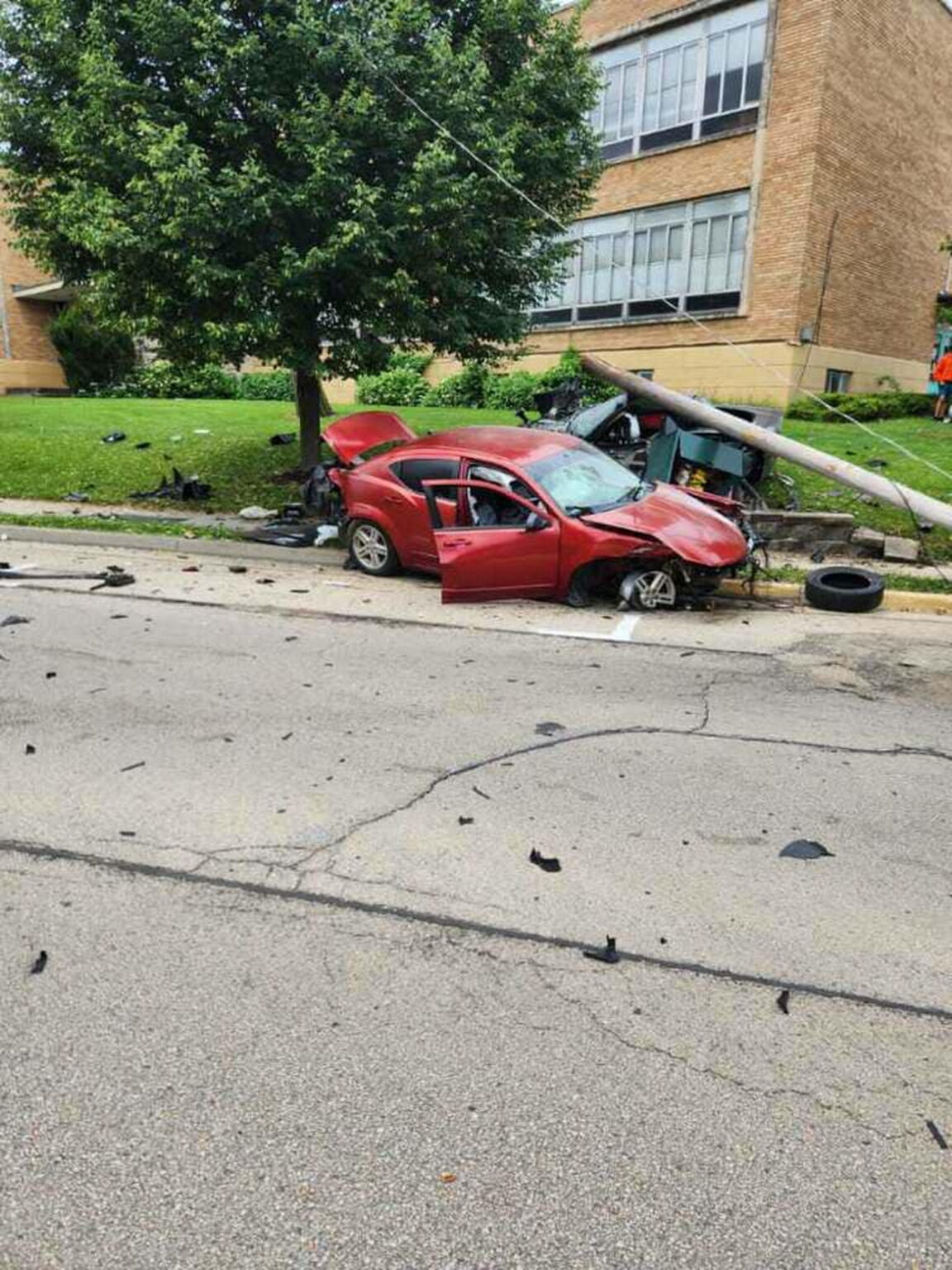 Violent Chevrolet Corvette And Dodge Avenger Crash Sends Four To ...