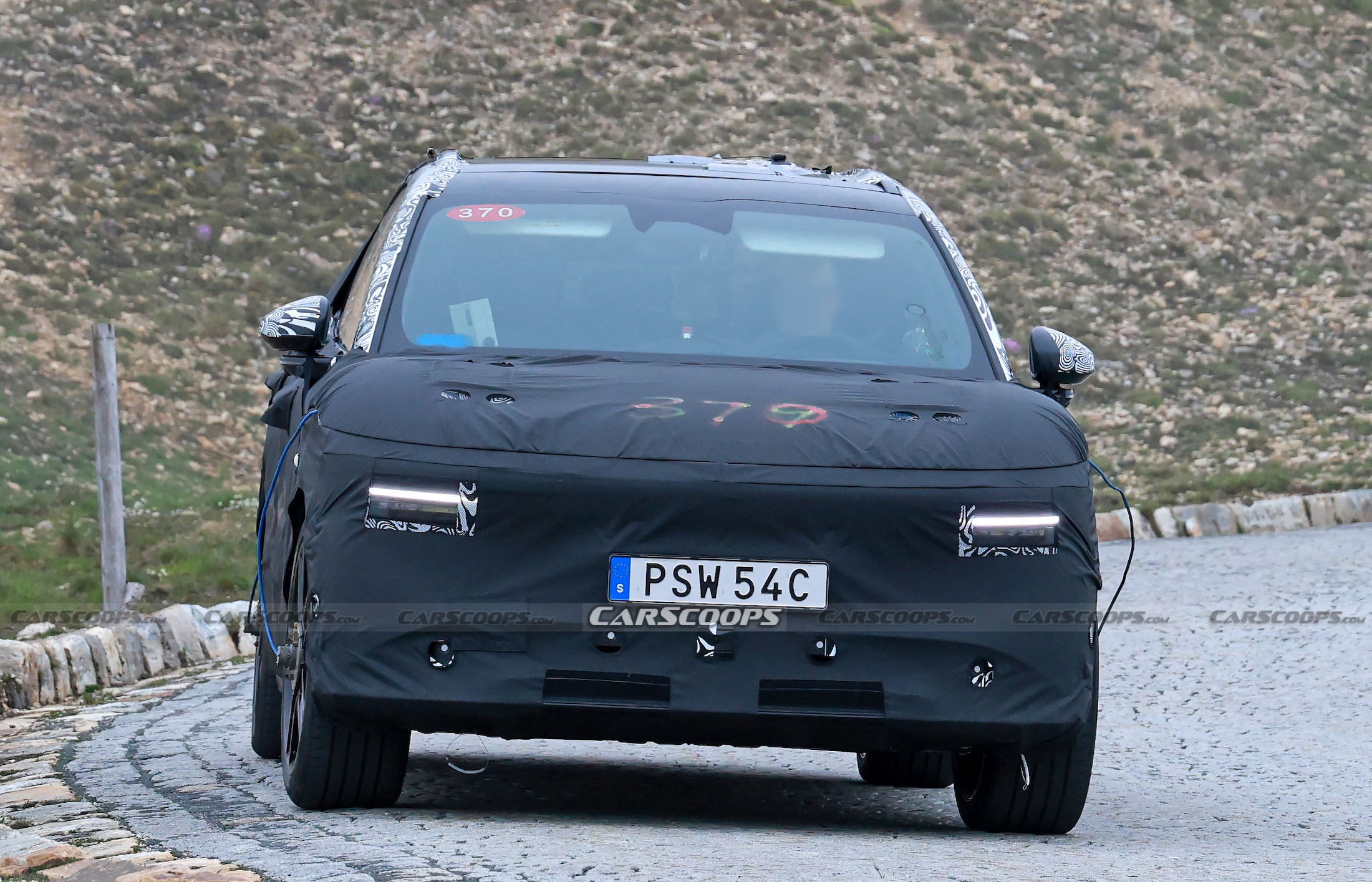 Zeekr CX1E Has The Tesla Model Y’s Face On Its Punchbag | Carscoops