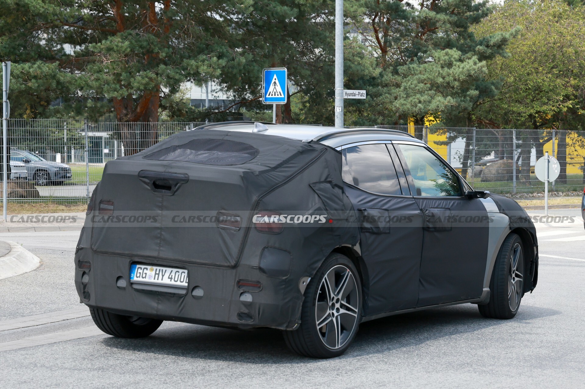 2026 Genesis GV60 Spied With New Widescreen Display, Sportier Steering ...