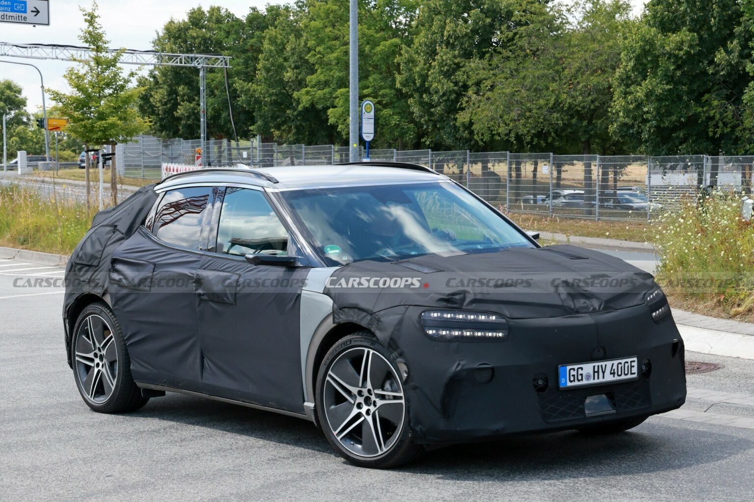 2026 Genesis GV60 Spied With New Widescreen Display, Sportier Steering ...