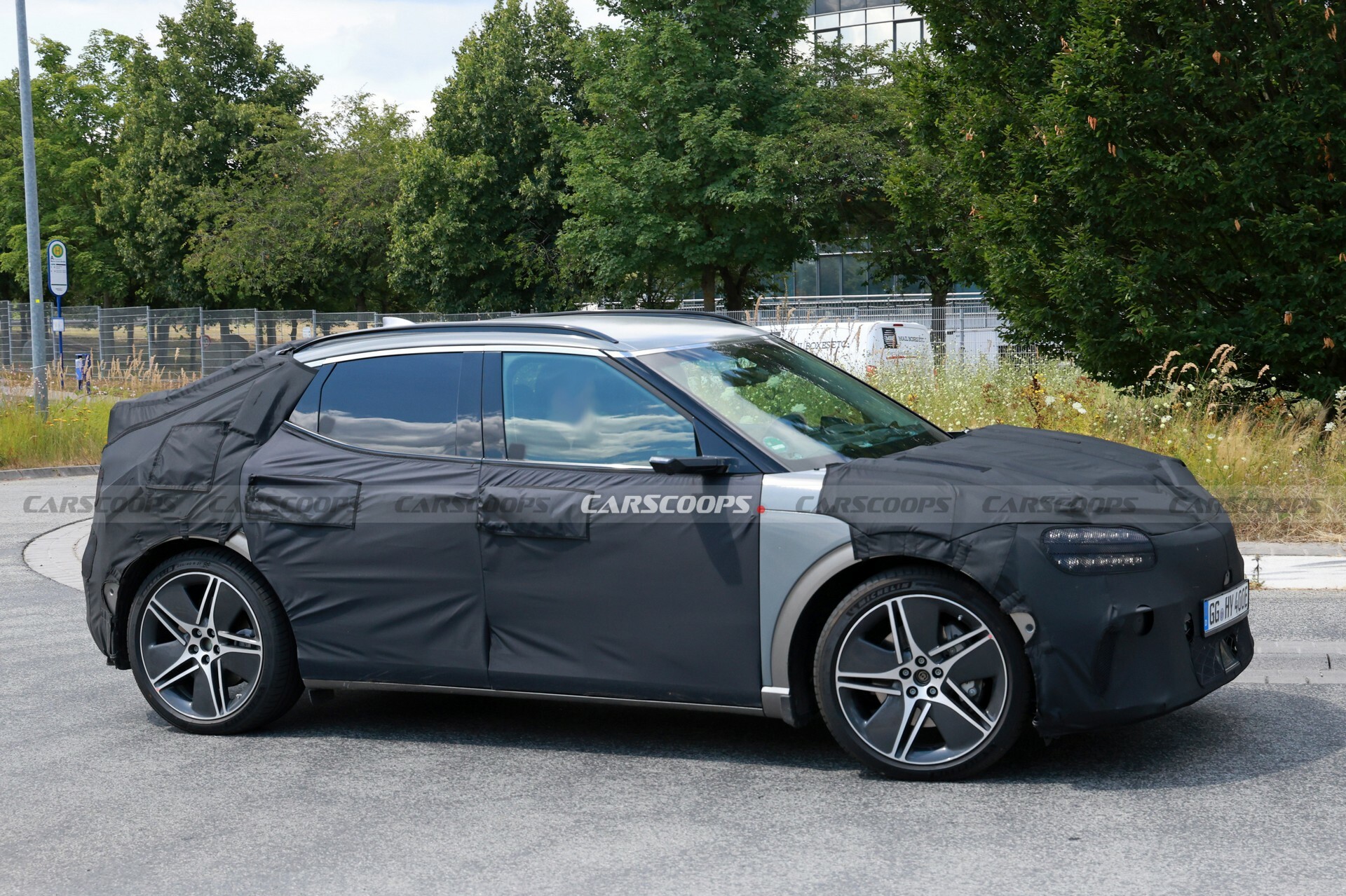 2026 Genesis GV60 Spied With New Widescreen Display, Sportier Steering ...