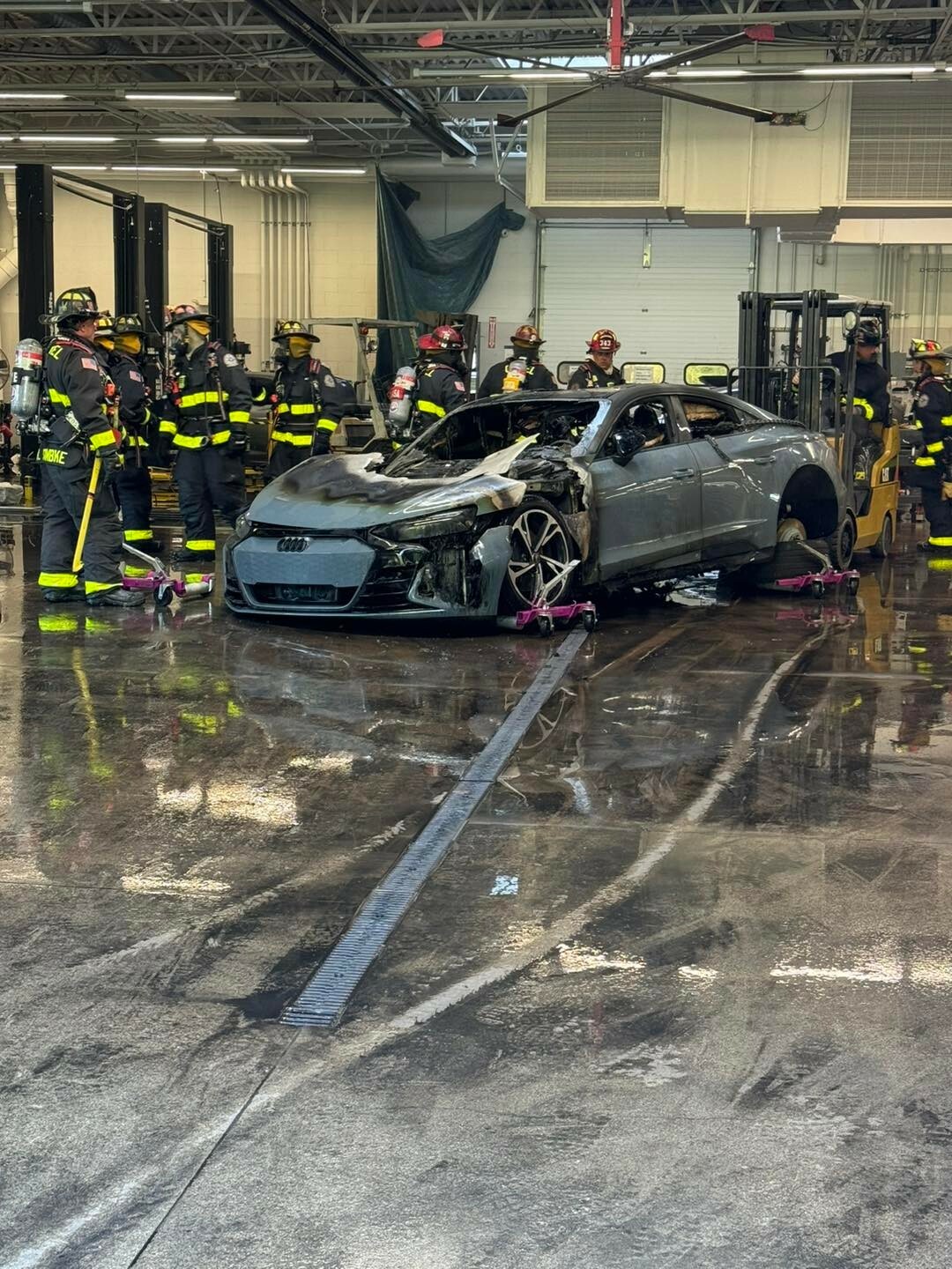 Audi E-Tron GT Bursts Into Flames Inside Dealership | Carscoops