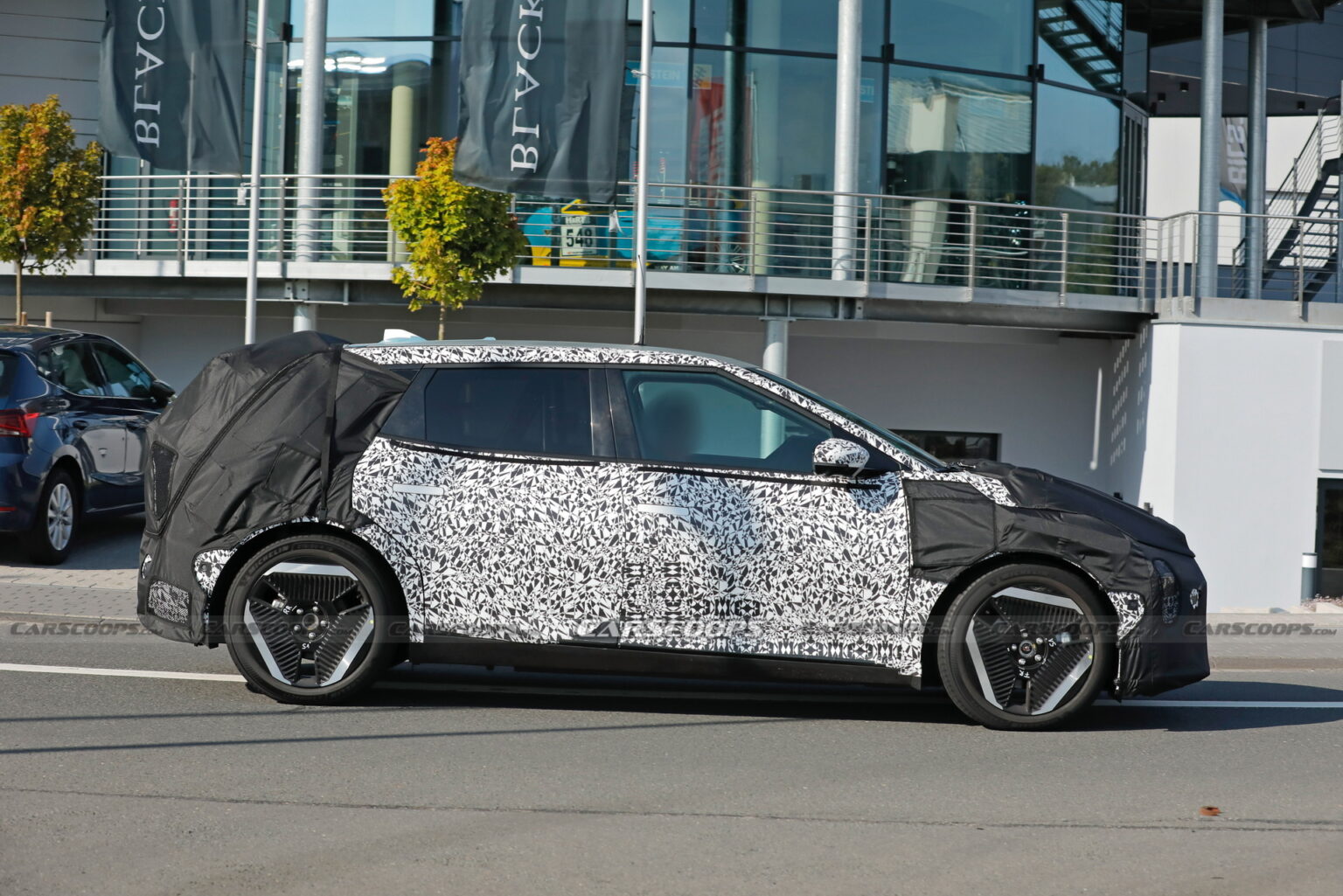 Kia EV4 Hatch Drops More Camo As It Hunts The MG4 | Carscoops