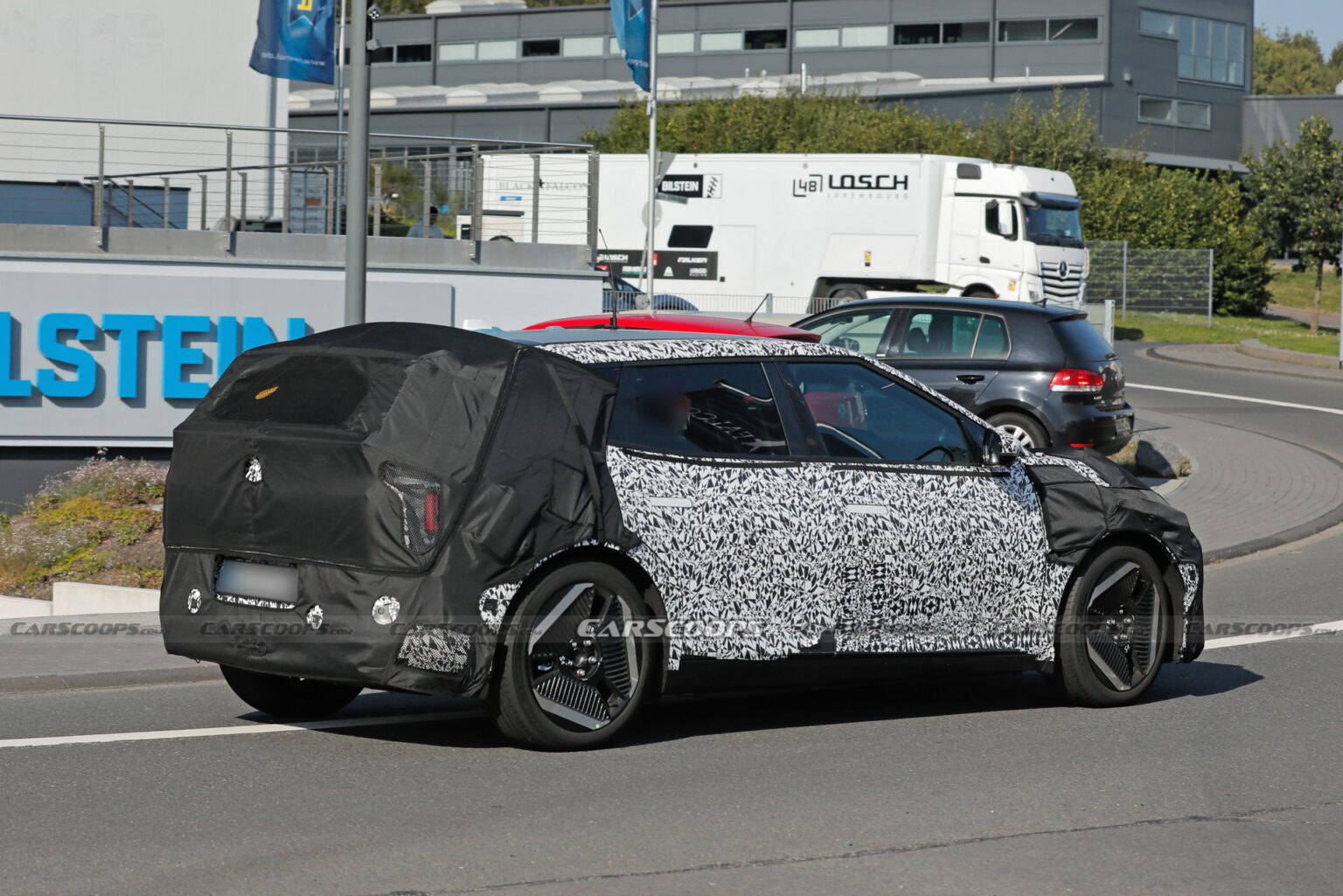 Kia EV4 Hatch Drops More Camo As It Hunts The MG4 | Carscoops