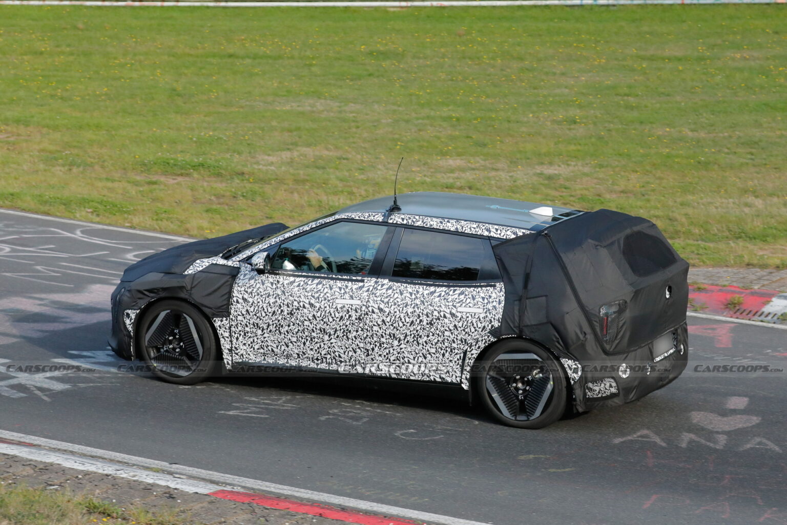 Kia EV4 Hatch Drops More Camo As It Hunts The MG4 | Carscoops