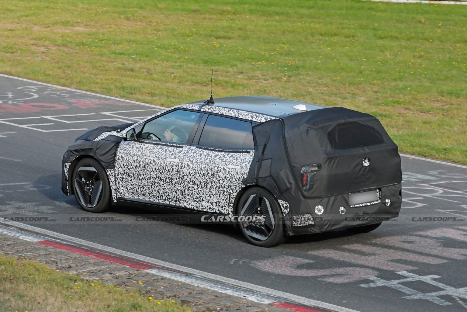 Kia EV4 Hatch Drops More Camo As It Hunts The MG4 | Carscoops