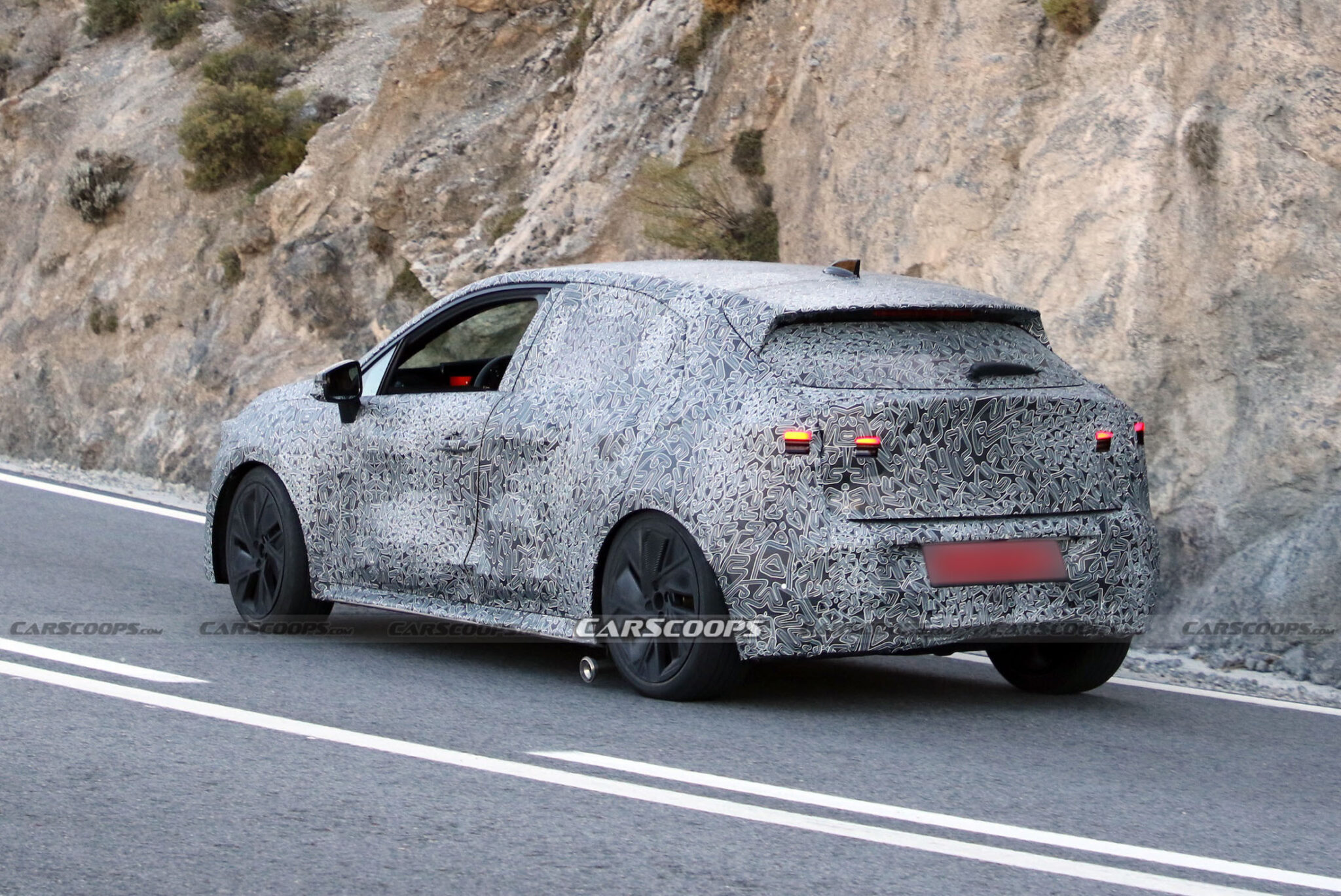 2026 Renault Clio Spied For The First Time With Weird Side-Exit Exhaust ...