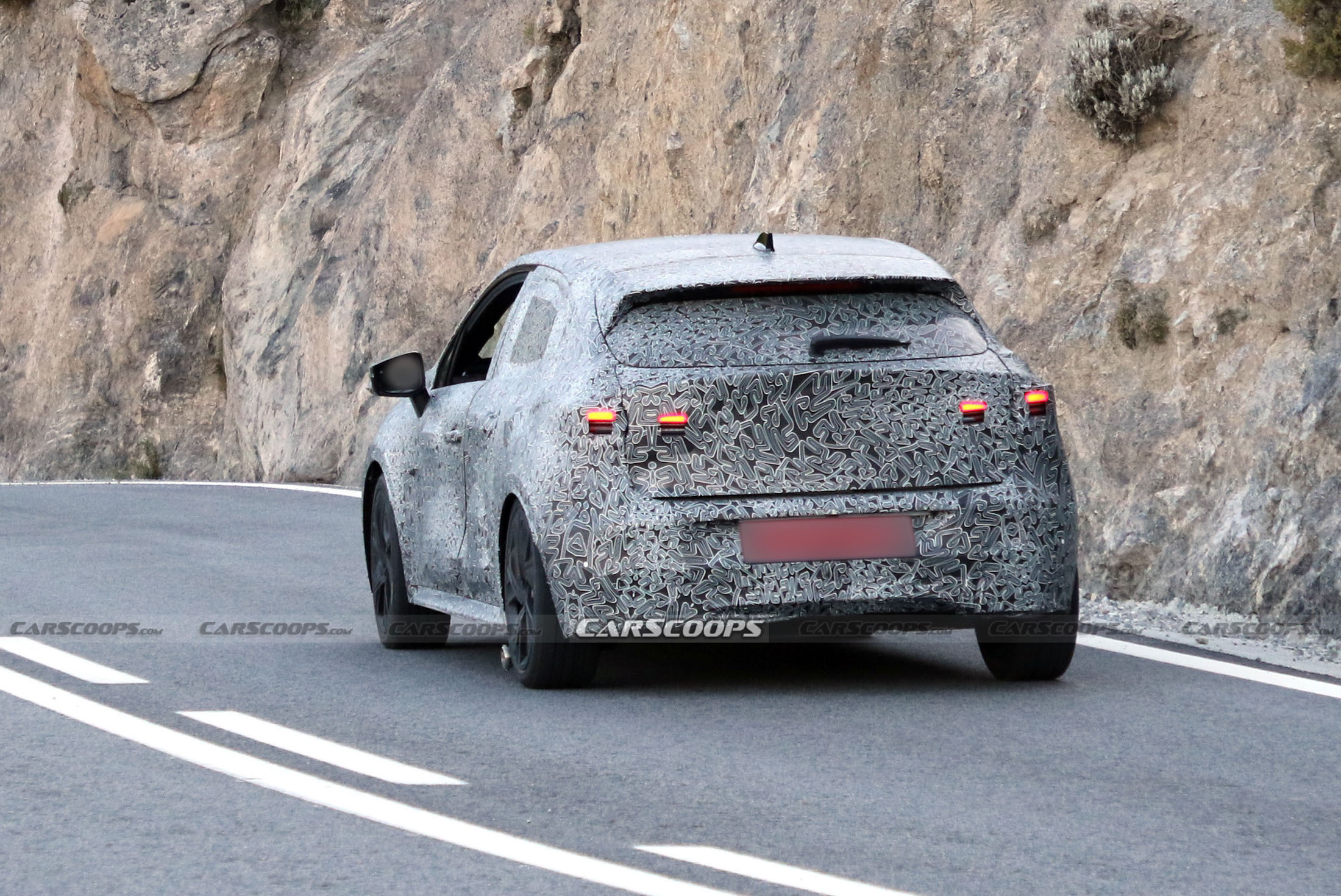 2026 Renault Clio Spied For The First Time With Weird Side-Exit Exhaust ...