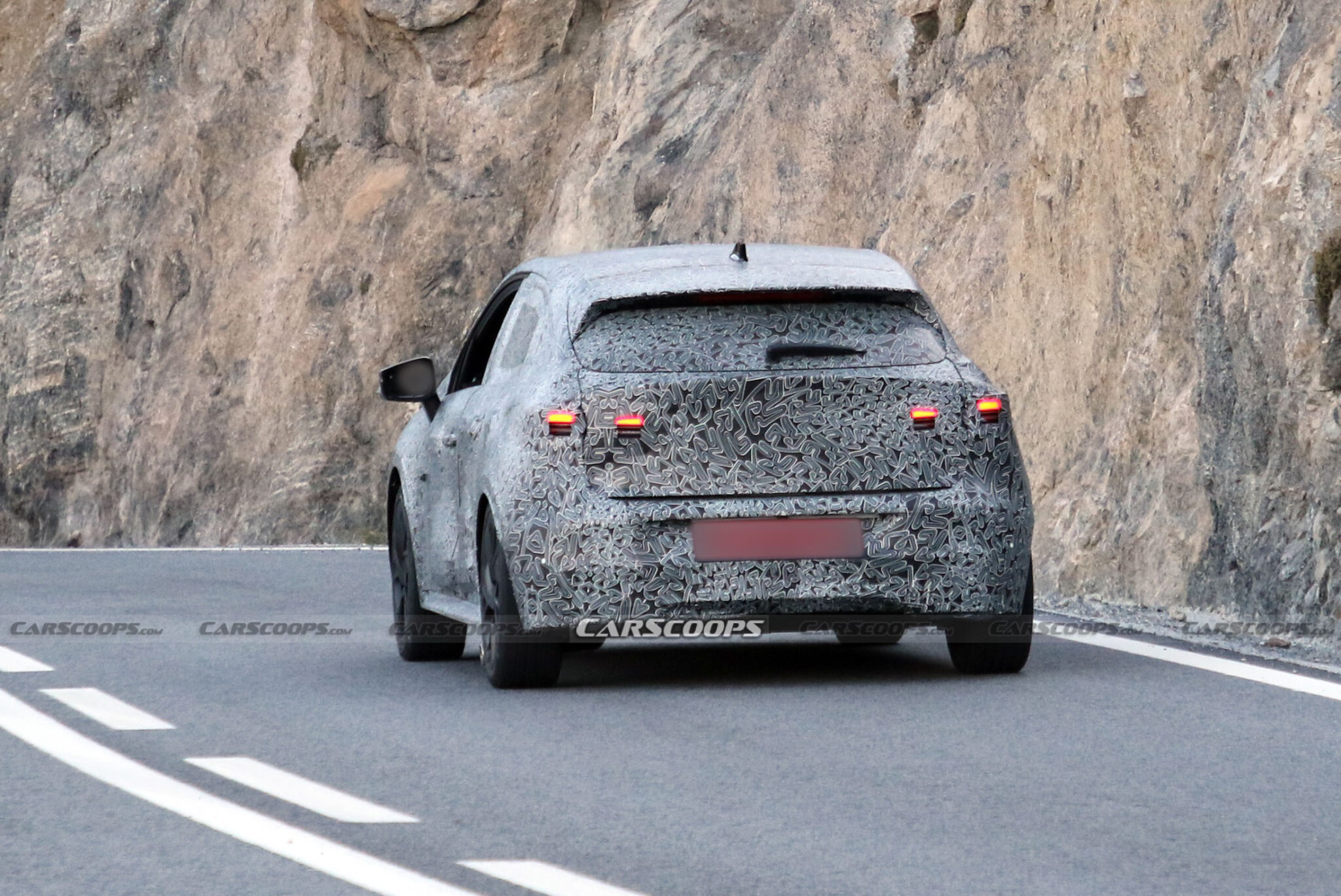 2026 Renault Clio Spied For The First Time With Weird Side-Exit Exhaust ...