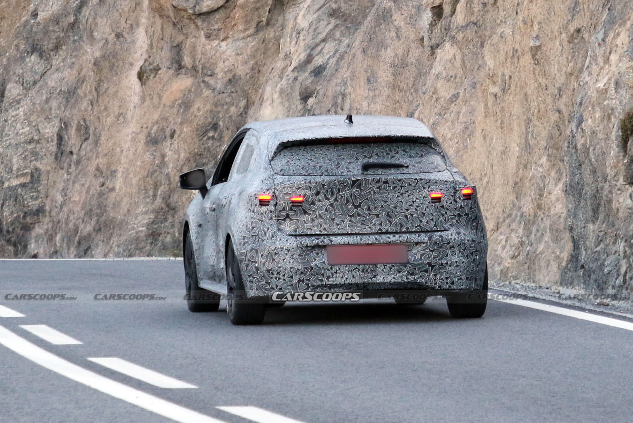2026 Renault Clio Spied For The First Time With Weird Side-Exit Exhaust ...