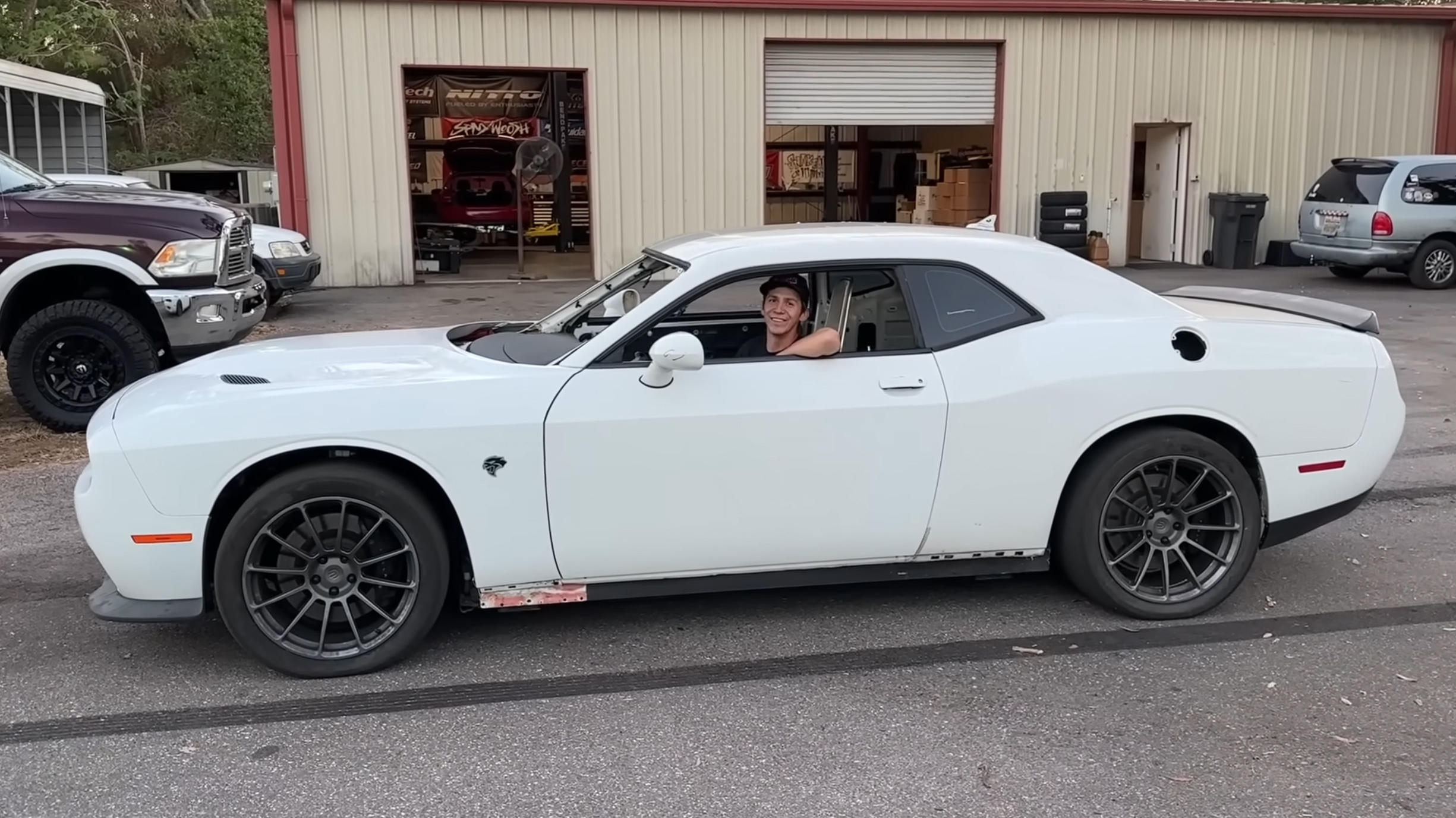 Tesla Model S Plaid Transforms Into A Dodge Challenger Hellcat After ...