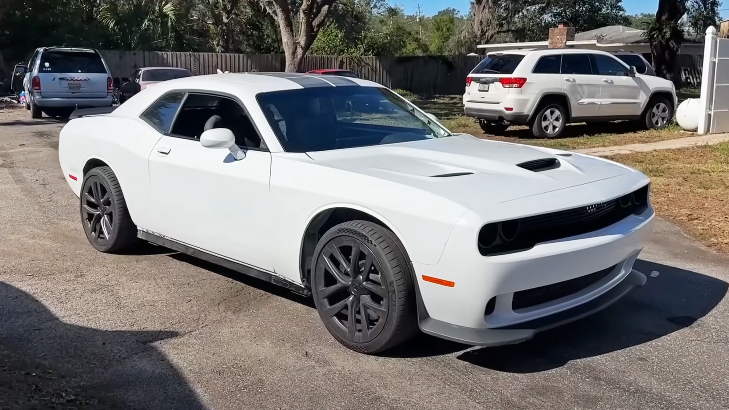 Tesla Model S Plaid Transforms Into A Dodge Challenger Hellcat After ...