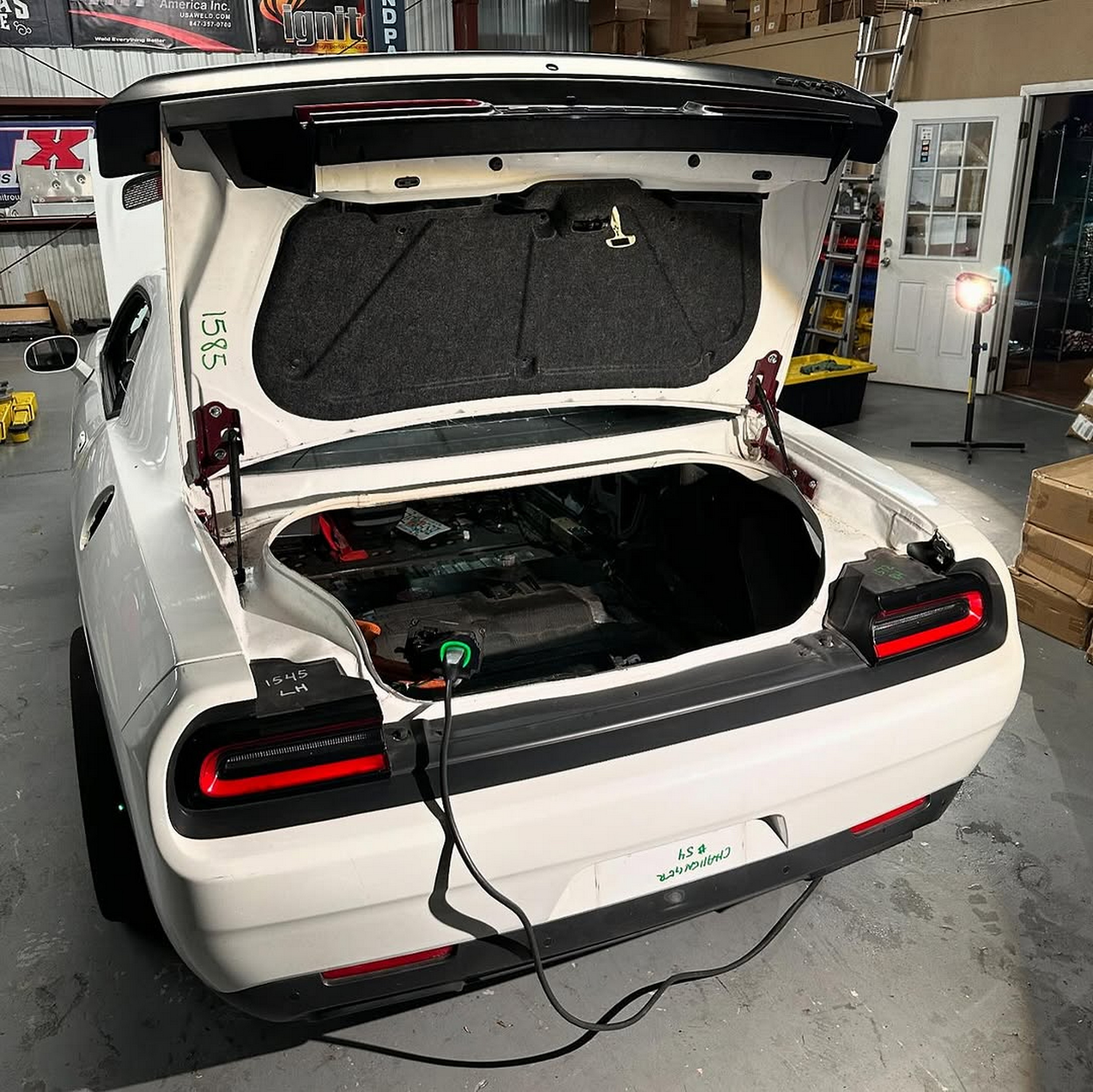 Tesla Model S Plaid Transforms Into A Dodge Challenger Hellcat After ...