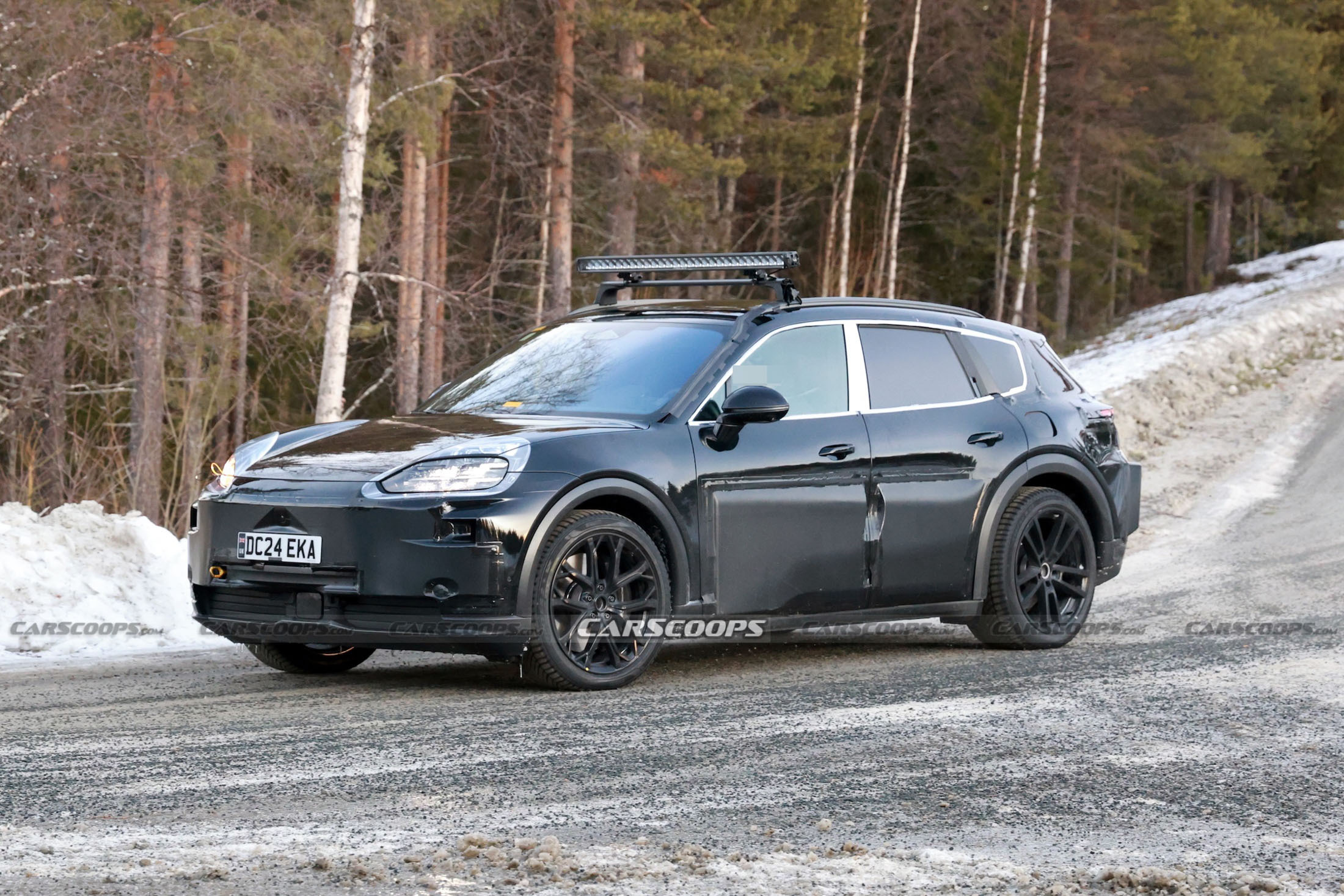 Bentley’s First EV Caught Hiding Under Porsche Cayenne Disguise | Carscoops