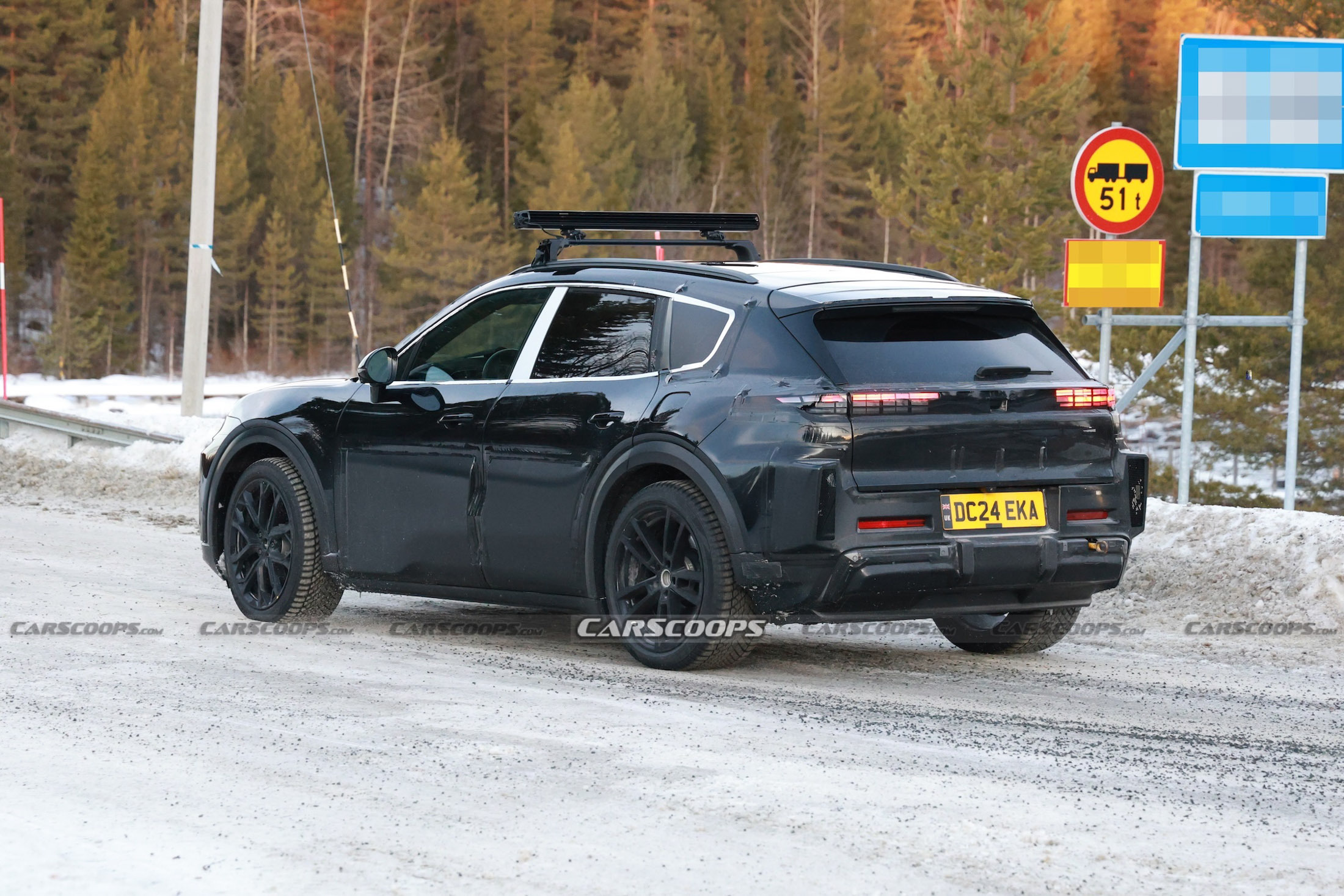 Bentley’s First EV Caught Hiding Under Porsche Cayenne Disguise | Carscoops