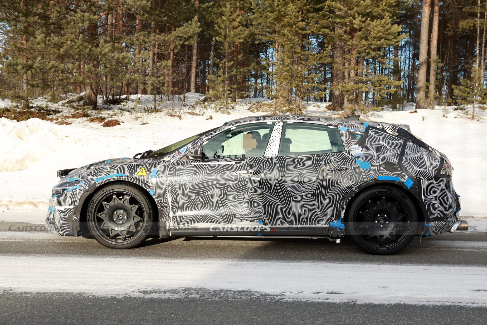 Ferrari’s First EV Spied Up Close While Charging | Carscoops