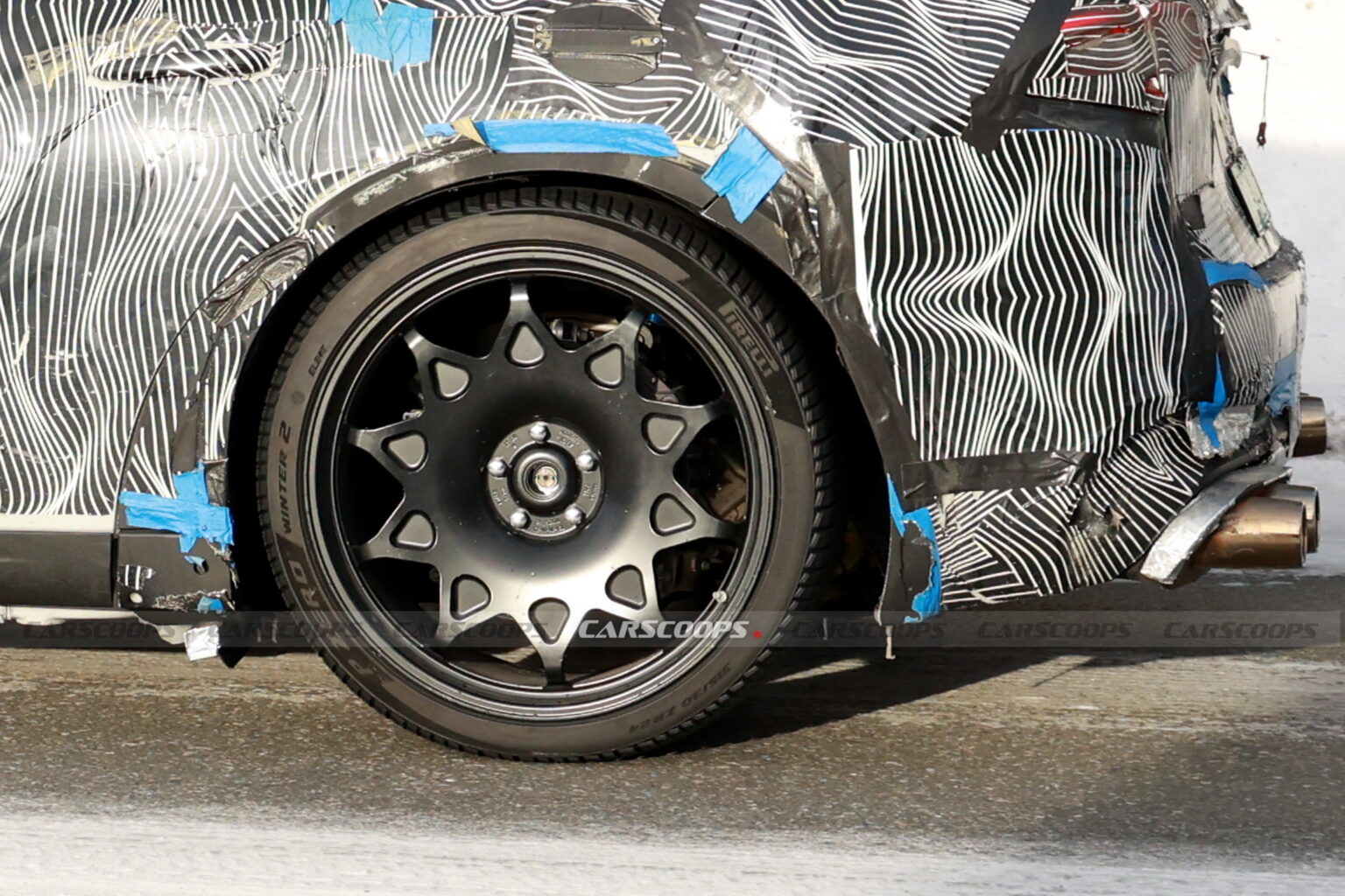 Ferrari’s First EV Spied Up Close While Charging | Carscoops