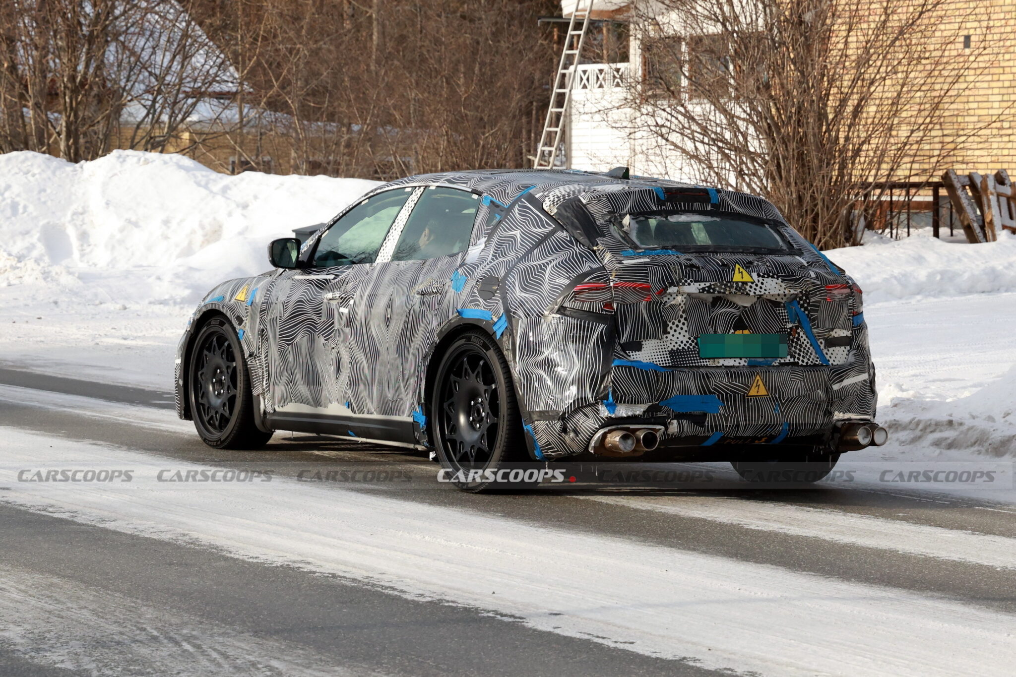 Ferrari’s First EV Spied Up Close While Charging | Carscoops