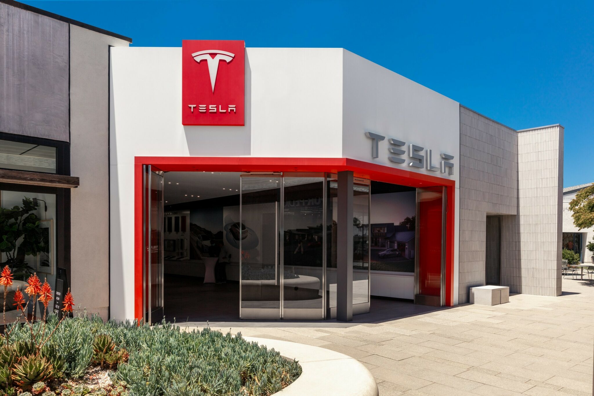 Tesla Store Hit With “Nazi Cars” Graffiti By Would-Be Arsonist | Carscoops