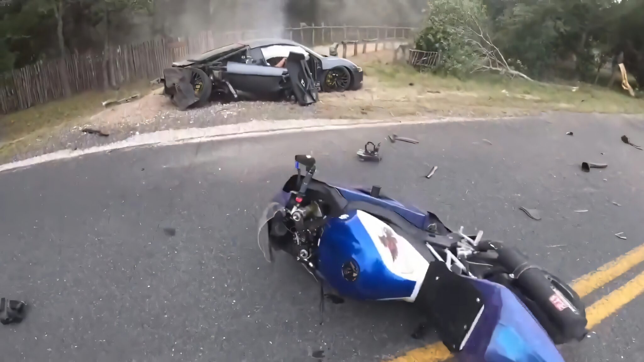 Audi R8 Crashes Into Tree, Motorcyclist Wrecks Trying To Dodge Debris ...