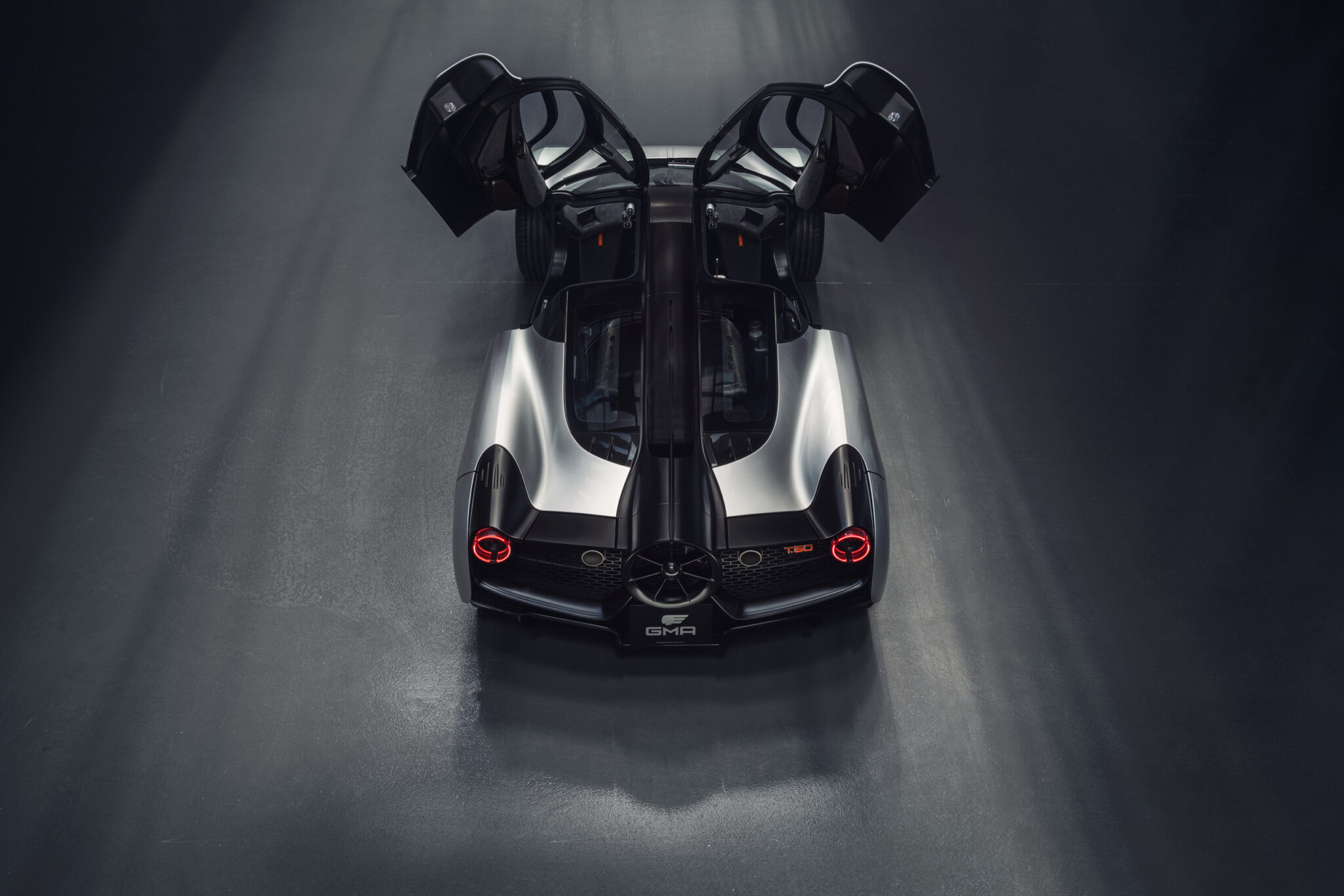 This V12 Supercar Gets 30 MPG And Still Clears Speed Bumps Like A Civic ...