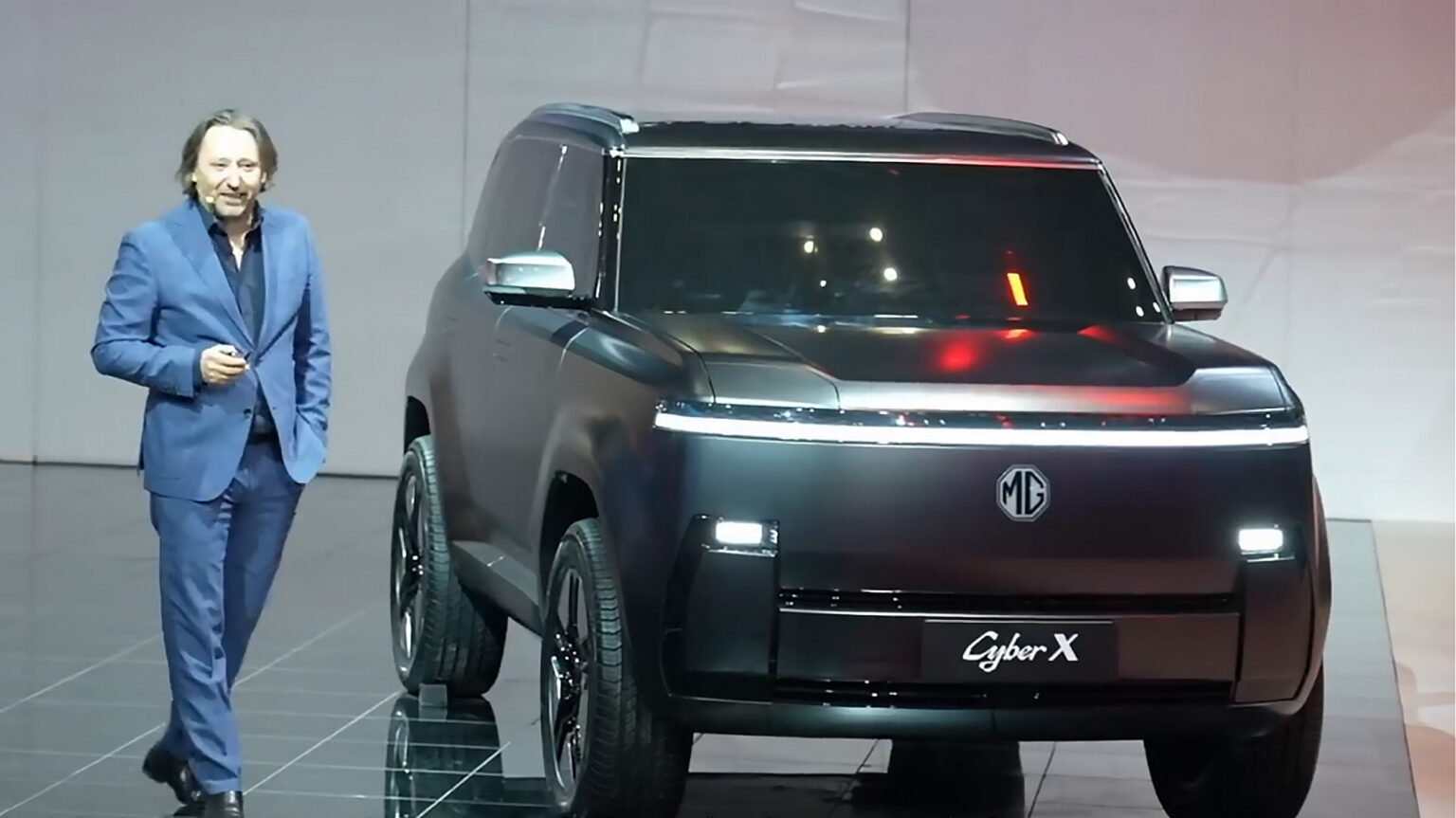 MG’s Electric SUV Looks Like A Mini Land Cruiser With Pop-Up Lights ...