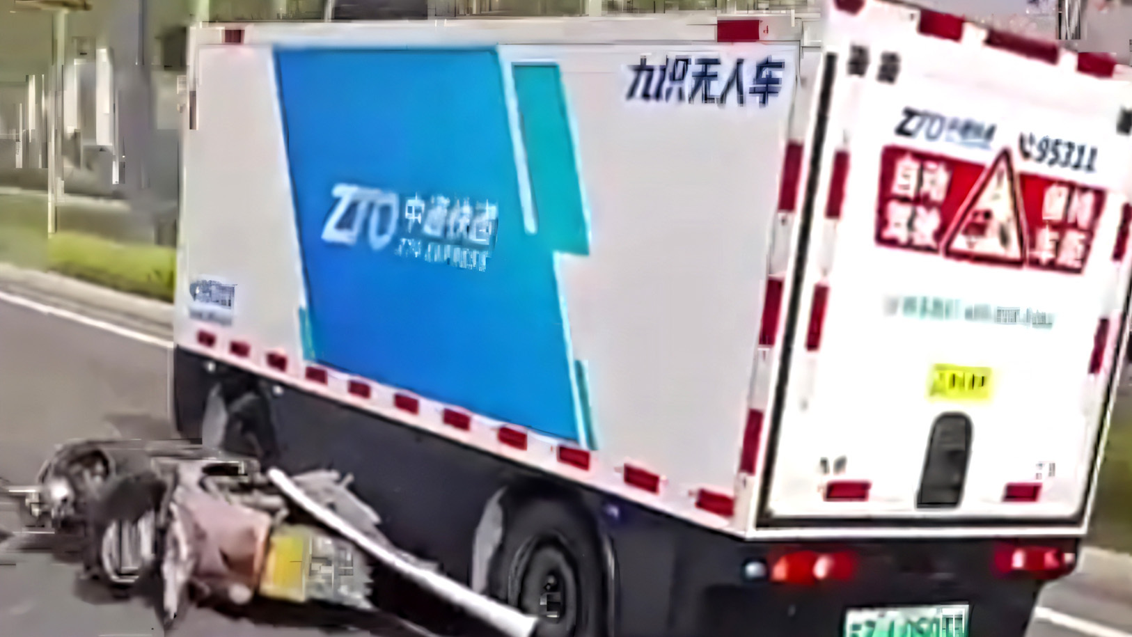 Self-Driving Delivery Van Drags Scooter In Viral Video | Carscoops