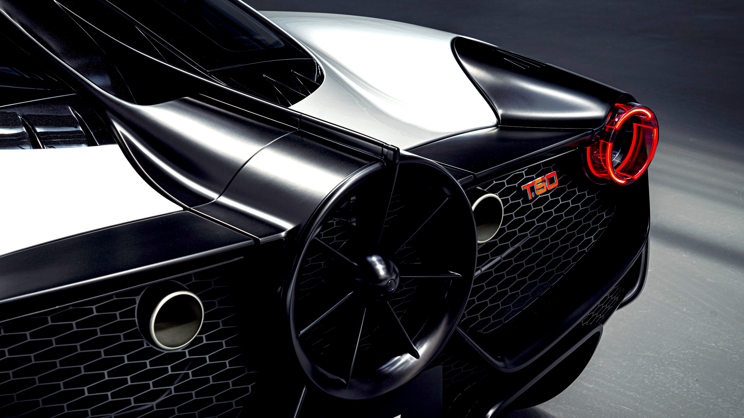 This V12 Supercar Gets 30 MPG And Still Clears Speed Bumps Like A Civic ...