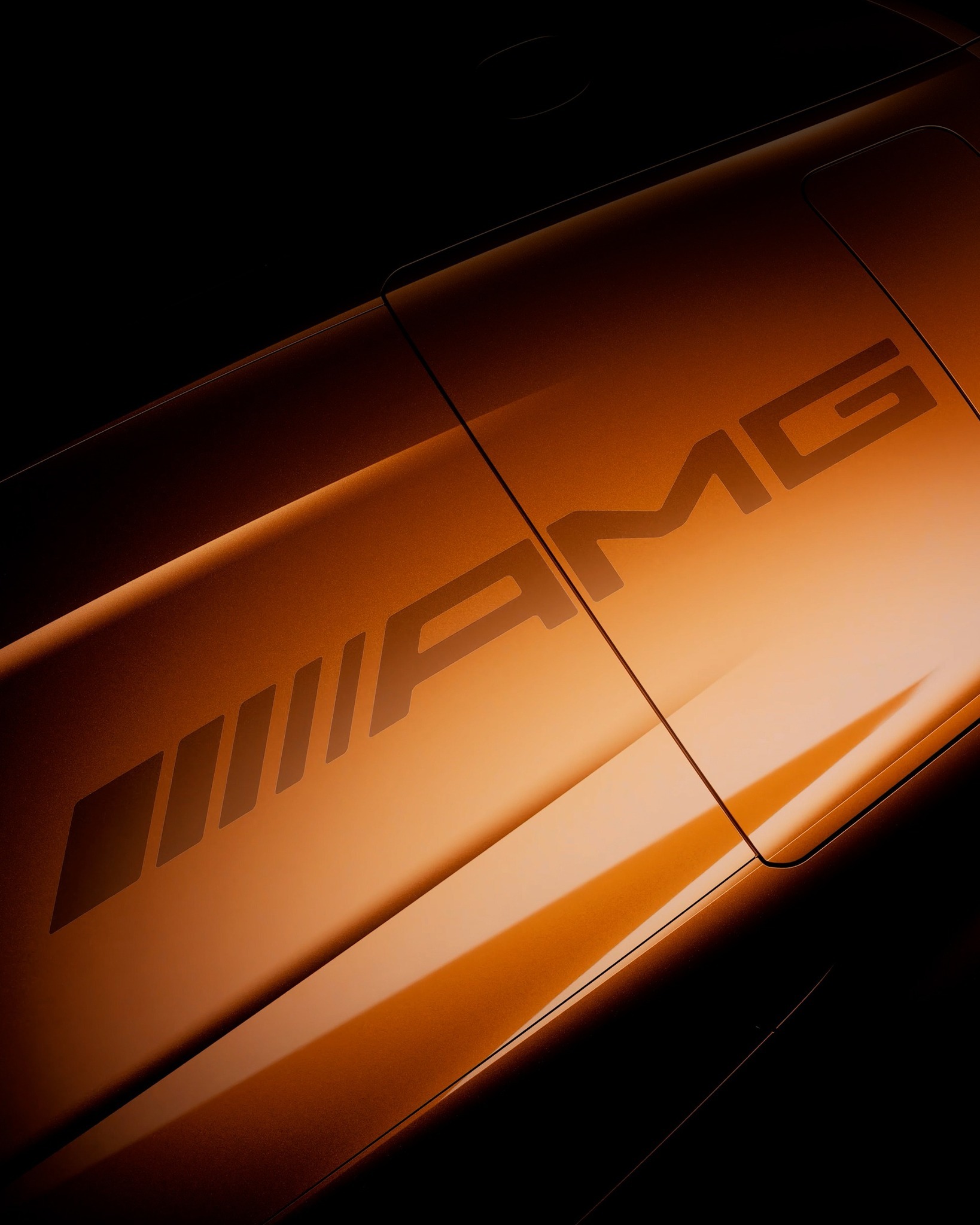 AMG Teases Something Wild And Orange But There’s No Rear Window In ...