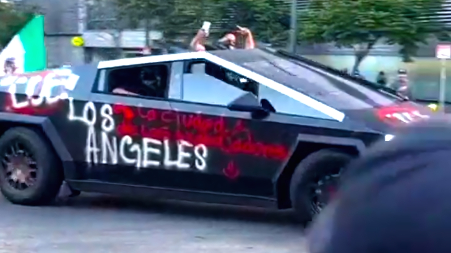 Protesters Torch Robotaxis As Cybertruck Spins Through LA Chaos | Carscoops