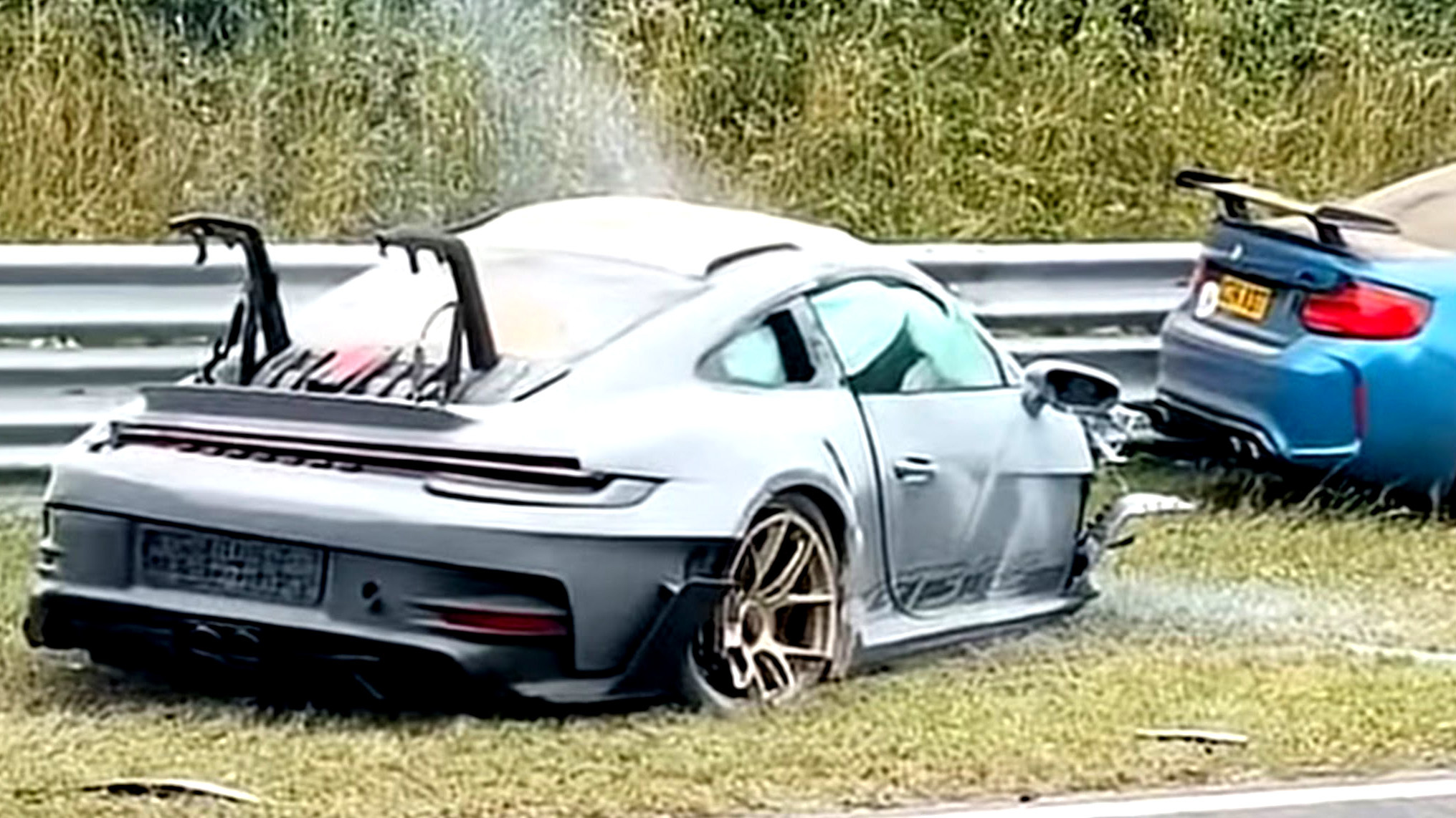 Watch Shocking Video Of Porsche And BMW Collide In Fiery Nurburgring ...