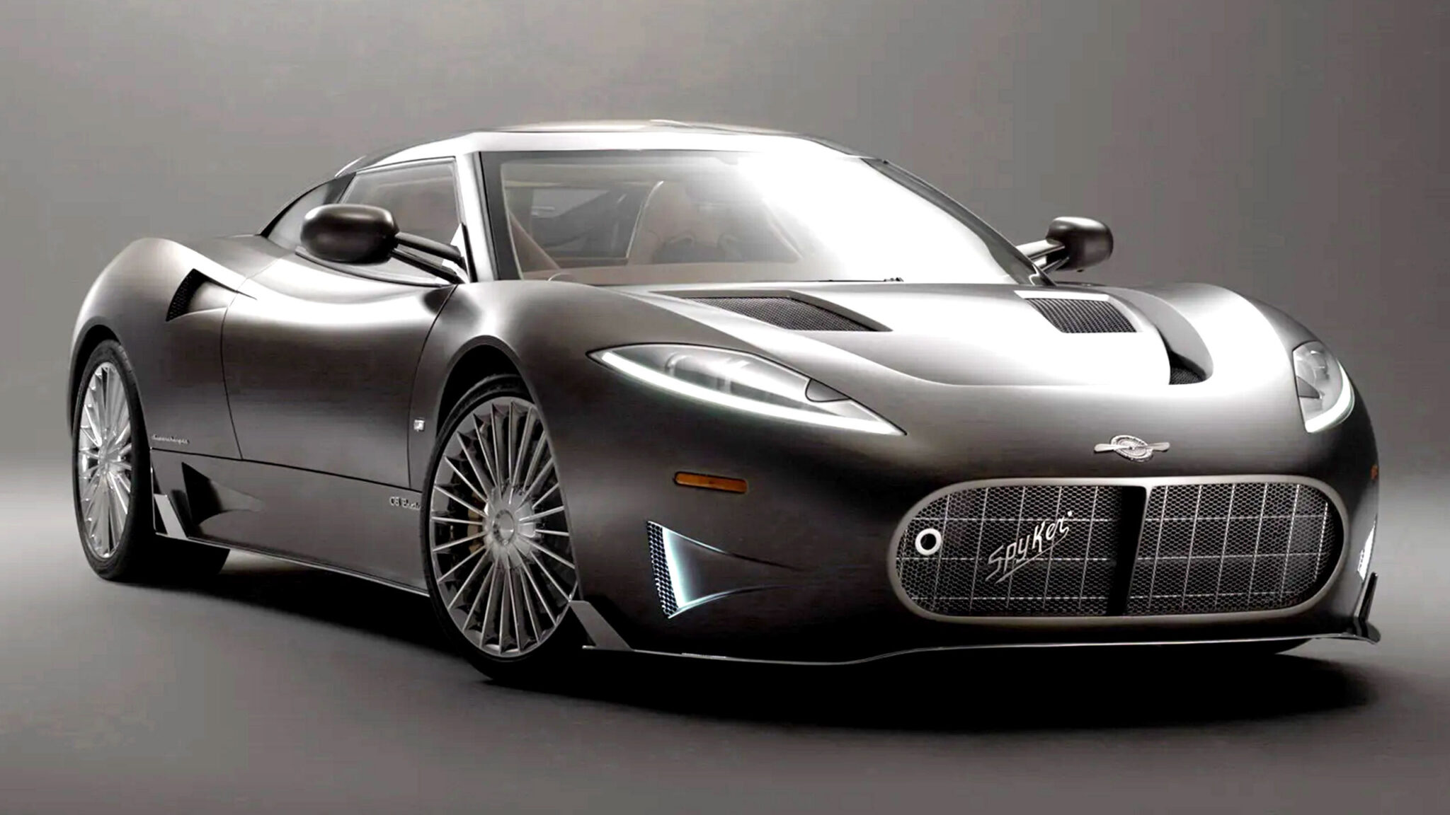 This V12 Supercar Gets 30 MPG And Still Clears Speed Bumps Like A Civic ...